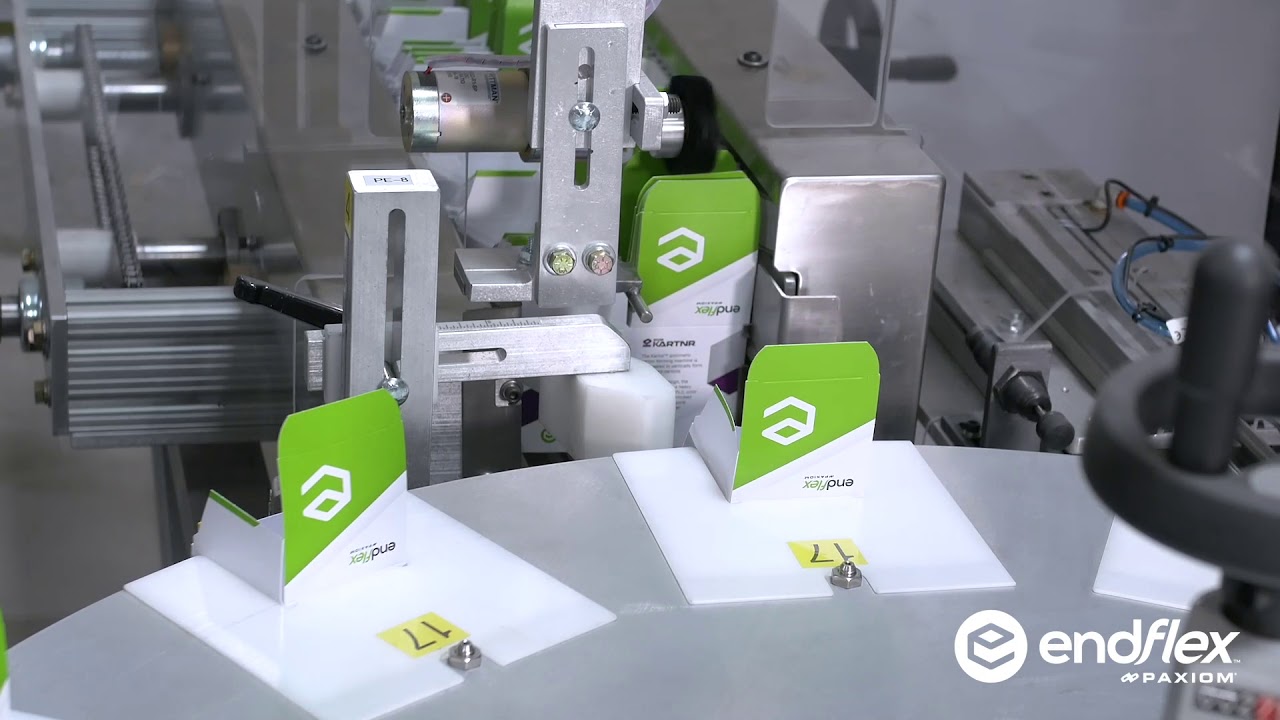 Kartnr vertical cartoning system with automatic jar loading